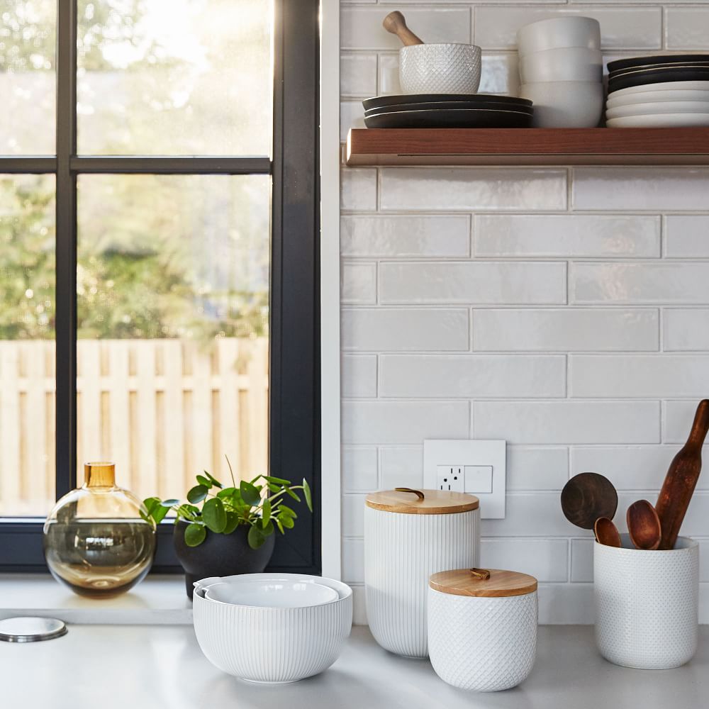 White ceramic canisters store